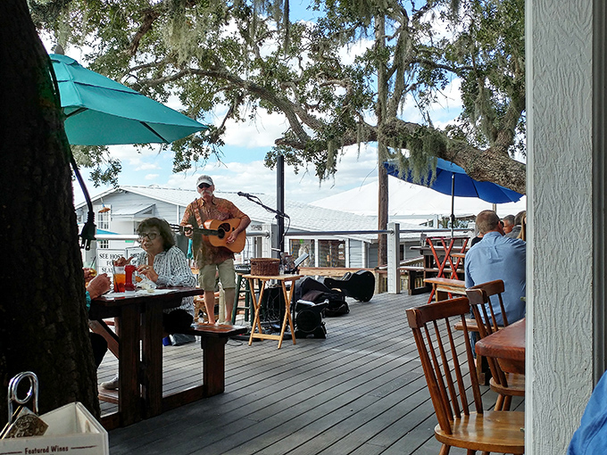 Live music drifts across the deck as diners sip and savor, proving that some of life's best soundtracks aren't on your playlist.