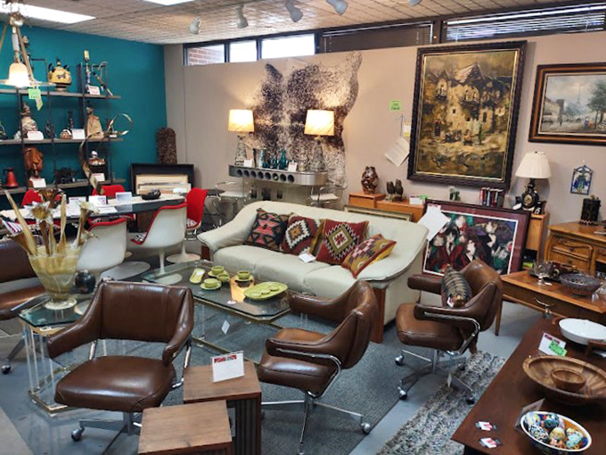 Sleek modern furniture meets vintage charm in this perfectly curated living room time capsule display.