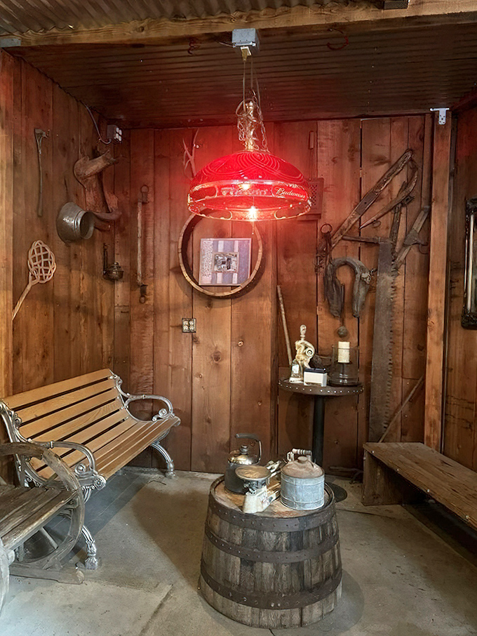 The waiting area feels like your coolest friend's cabin. That red lamp casts the kind of glow that makes everyone look mysterious.