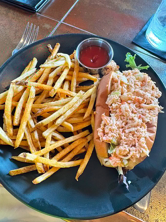 The lobster roll&mdash;summer vacation in sandwich form. Golden fries stand at attention beside this New England classic.