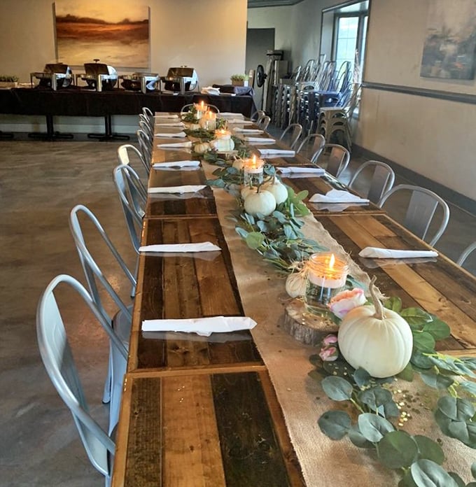 Not just a table setting—it's an invitation to gather. Those white pumpkins and greenery say, "Yes, we smoke meat, but we also have style."