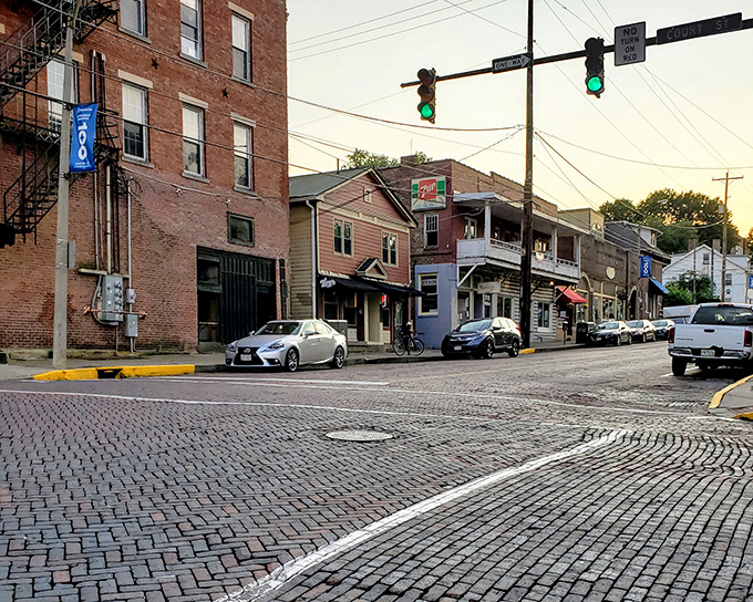 Looking west down Athens' brick streets reveals the town's gentle hills, where residential neighborhoods rise above the bustling downtown.