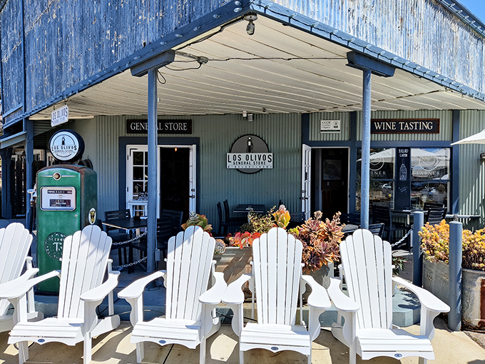 White Adirondack chairs invite lingering conversations outside the General Store. Wine tasting and people-watching—name a better combo.