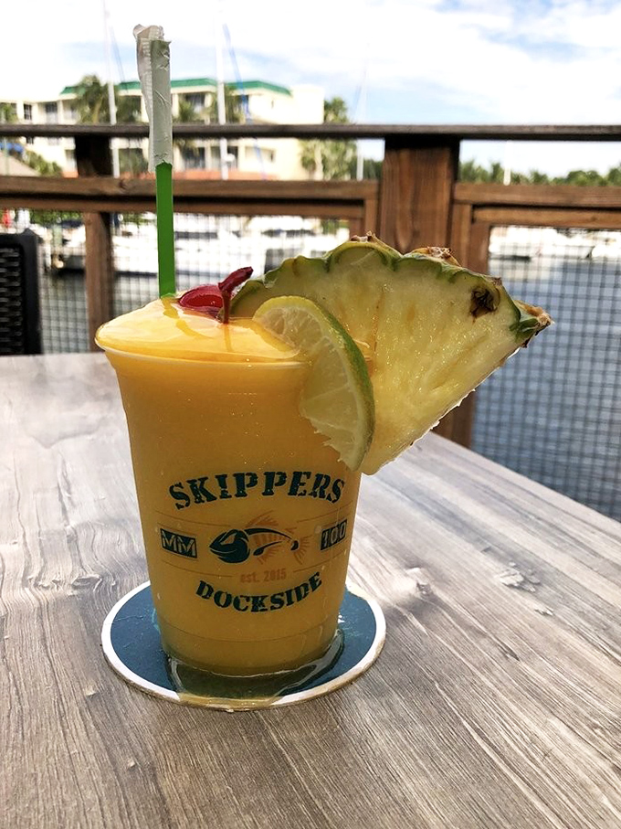 A mango daiquiri that captures Florida sunshine in a glass, complete with tropical garnish perfection.