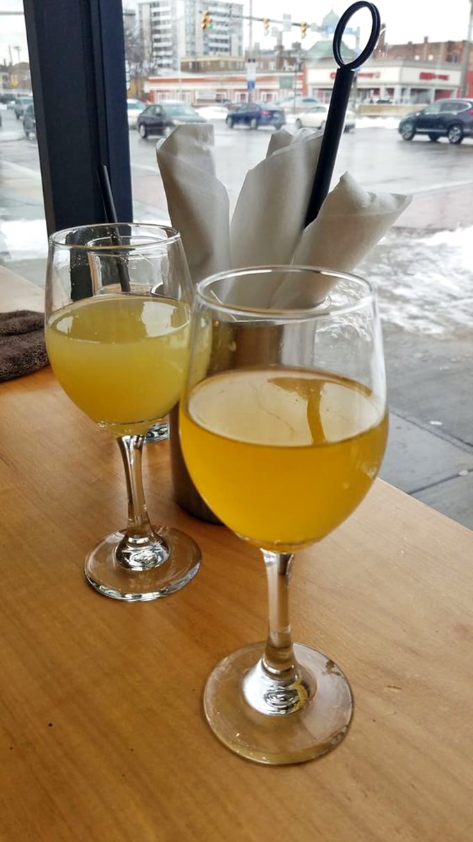Mimosas that look like liquid sunshine - the perfect companion for any meal that ends with unbuttoned pants.