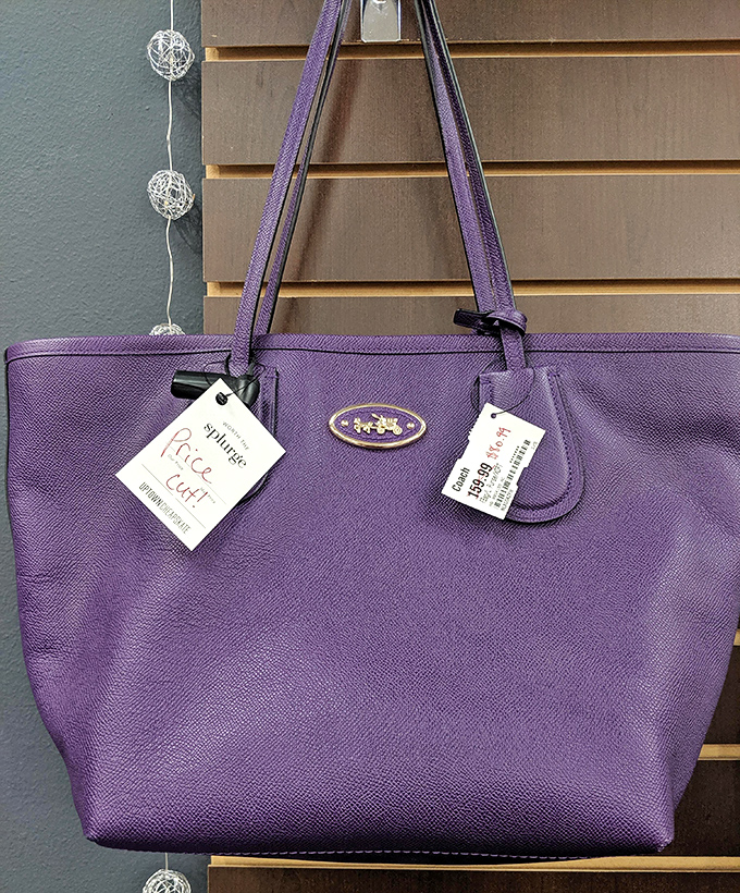 This purple Coach tote still flaunts its tags&mdash;proof that someone's shopping regret becomes your fashion triumph.