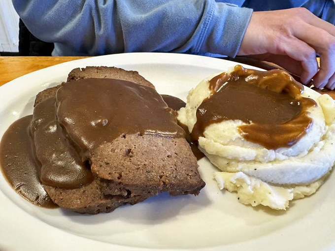 Meatloaf and mashed potatoes swimming in gravy&mdash;the kind of plate that makes you want to call your boss and take the afternoon off for a necessary nap.