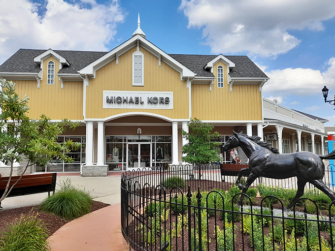 Michael Kors' sunny yellow storefront offers a cheerful backdrop for luxury handbags and accessories that won't require a second mortgage.