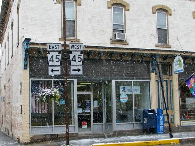 Local post office serves as community hub where mail carriers know your dog's name better than GPS.