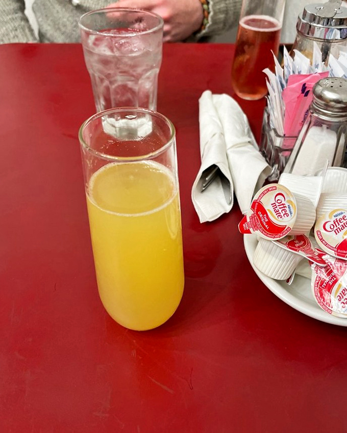 Golden mimosa in a classic glass&mdash;because sometimes breakfast calls for a little sparkle with your orange juice.