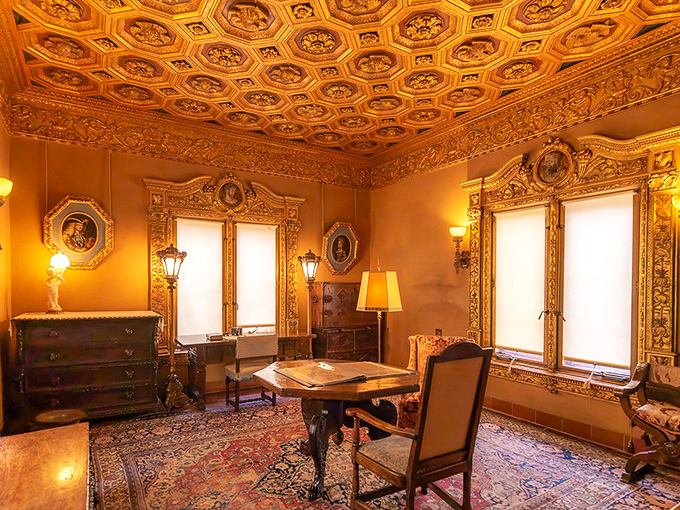 This study's honeyed glow comes from a coffered ceiling that took artisans months to create. Your home office suddenly feels inadequate.