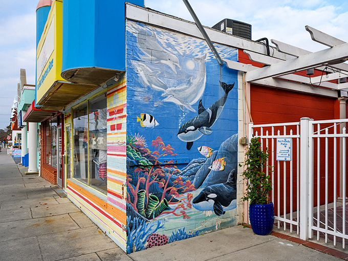 Ocean-inspired murals bring underwater scenes to street level, reminding passersby of the marine world just beyond the shoreline.