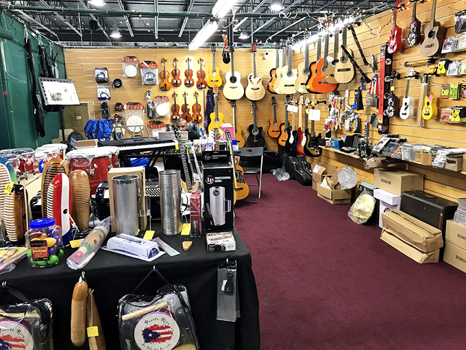 Musical dreams hang from the walls, each guitar promising to transform its future owner into the next Clapton or Santana.