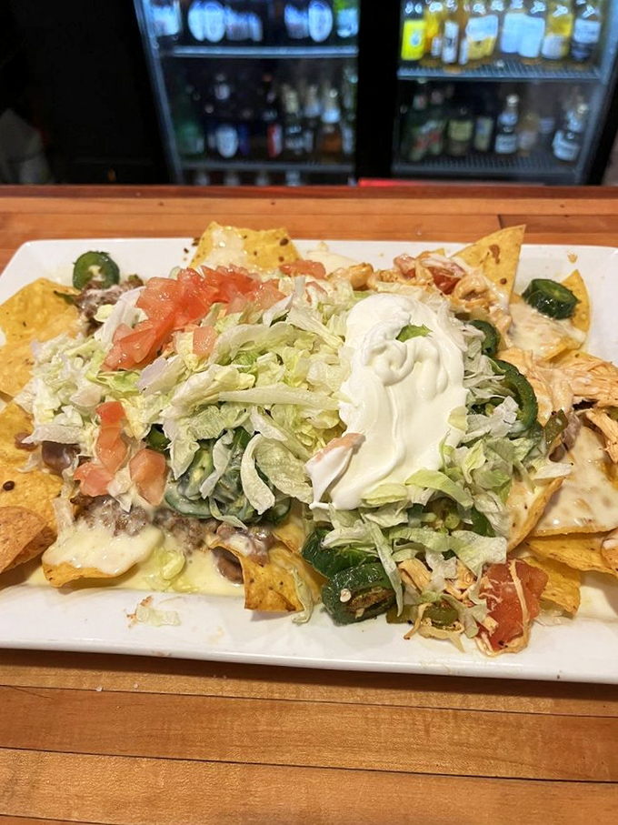 Nachos that require a commitment&mdash;a mountain of chips, cheese, and toppings that turns eating into an expedition worth every delicious step of the journey. 