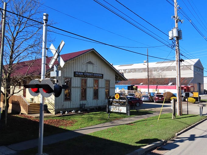 Another angle of Perry Street Station, where the railroad crossing signal seems to be saying "Stop! You're about to miss something historically significant!"