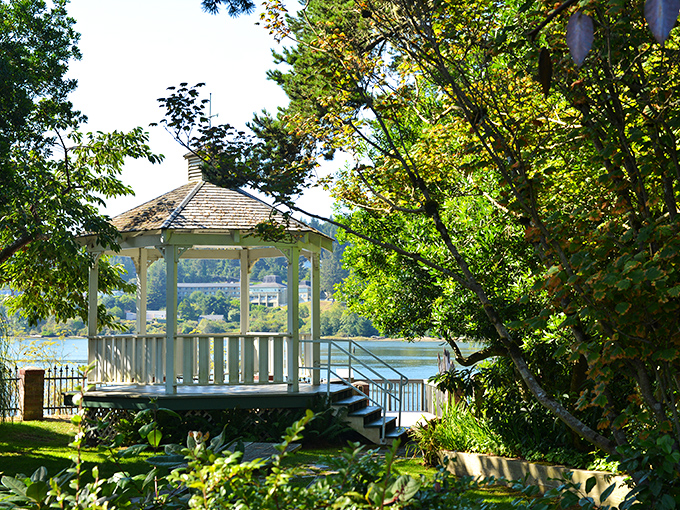 This riverside gazebo practically begs you to sit with coffee, watch the water, and pretend you're in a Nicholas Sparks novel. 