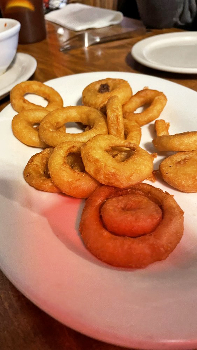 Onion rings with the perfect crunch-to-softness ratio—the kind that make you forget onions were ever meant to be eaten any other way.
