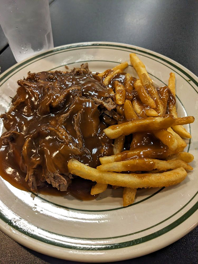 This open-faced roast beef sandwich swimming in rich gravy isn't just comfort food &ndash; it's a warm hug on a plate.