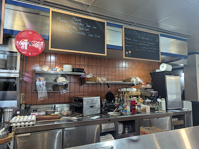 Behind the scenes where morning magic happens. That Coca-Cola clock has witnessed thousands of perfect pancake flips.