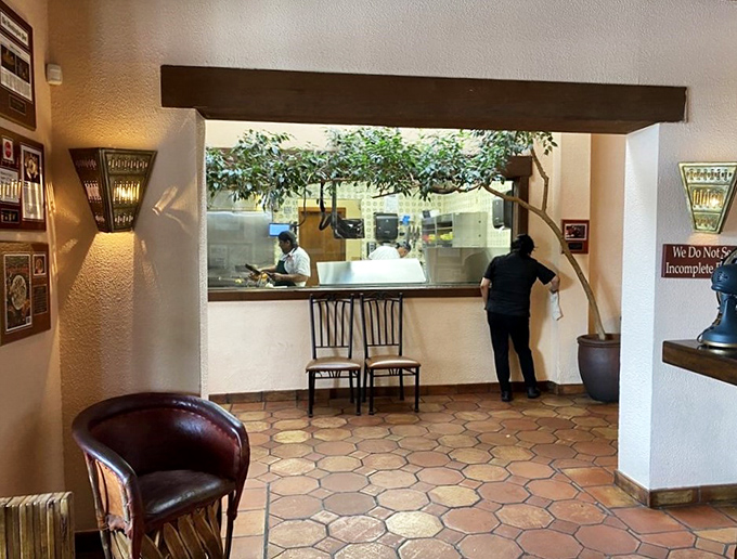 A glimpse into the ordering window &ndash; where culinary magic begins its journey from kitchen to your eagerly waiting taste buds.