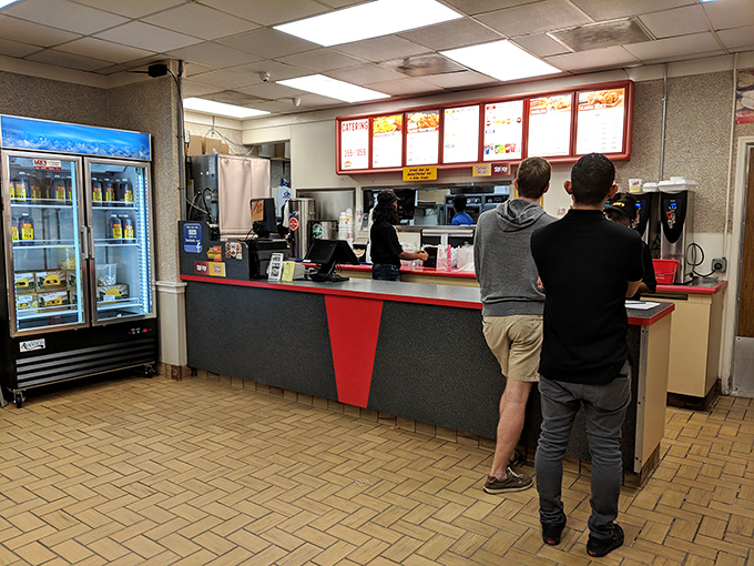 The order counter—where dreams are spoken aloud and then, miraculously, transformed into crispy reality within minutes.