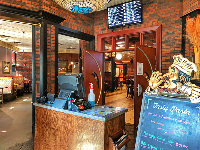 The host station welcomes you with warm brick surroundings and a chef statue that seems to say, "You've made an excellent dining decision today."