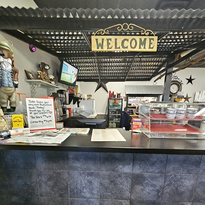 Under the "WELCOME" sign, friendly faces await to guide you through your comfort food journey with genuine small-town hospitality.