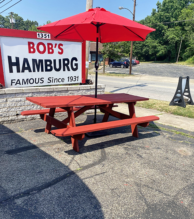 Al fresco dining, Bob's Hamburg style. That red picnic table has hosted more genuine happiness than most five-star restaurant patios ever will. 