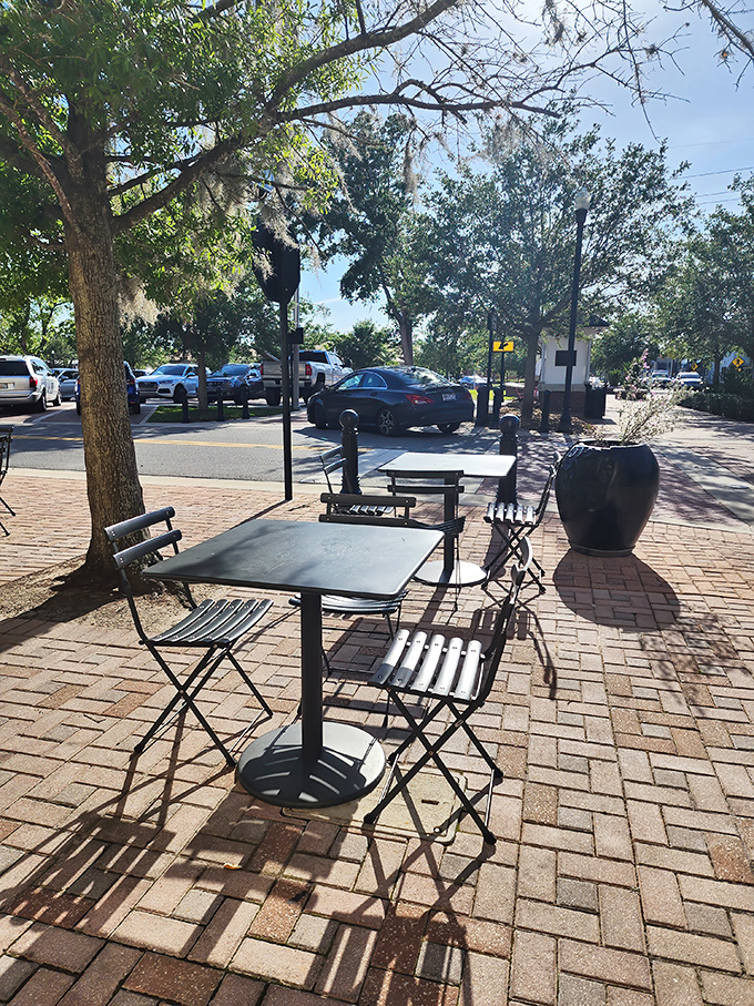 Sidewalk seating under Florida skies&mdash;where Winter Haven's charm meets al fresco dining for those perfect not-too-hot evenings.