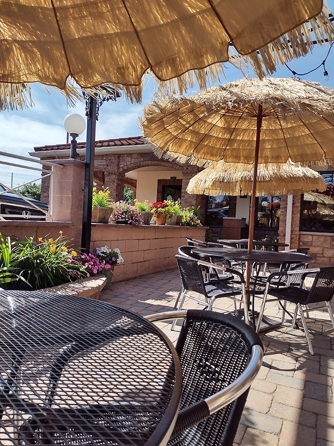 Those thatched umbrellas aren't just for show&mdash;they're portals to a mini-vacation. JoJo's outdoor seating area turns a random Tuesday into a special occasion.