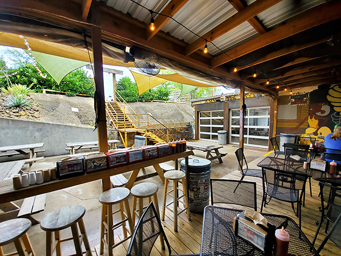 The outdoor seating area offers a perfect Texas trifecta: fresh air, cold drinks, and the lingering aroma of smoked meat wafting through the breeze.