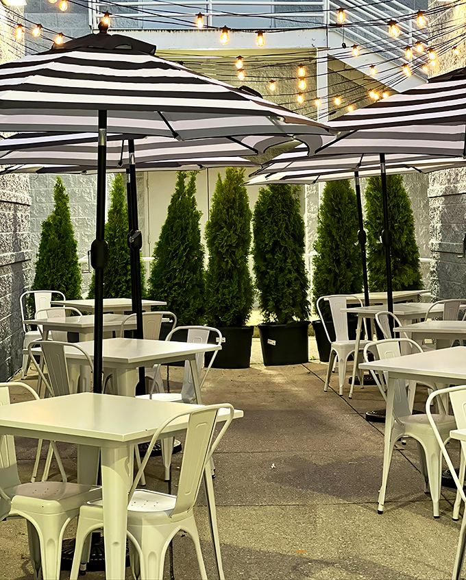 The outdoor patio&mdash;where striped umbrellas and potted greenery create an urban oasis perfect for people-watching while savoring every last crumb.