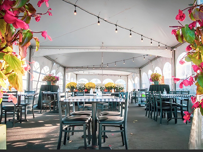 For warmer months, this outdoor tent setting offers al fresco dining with strings of lights that somehow make even meatloaf feel a little fancy.