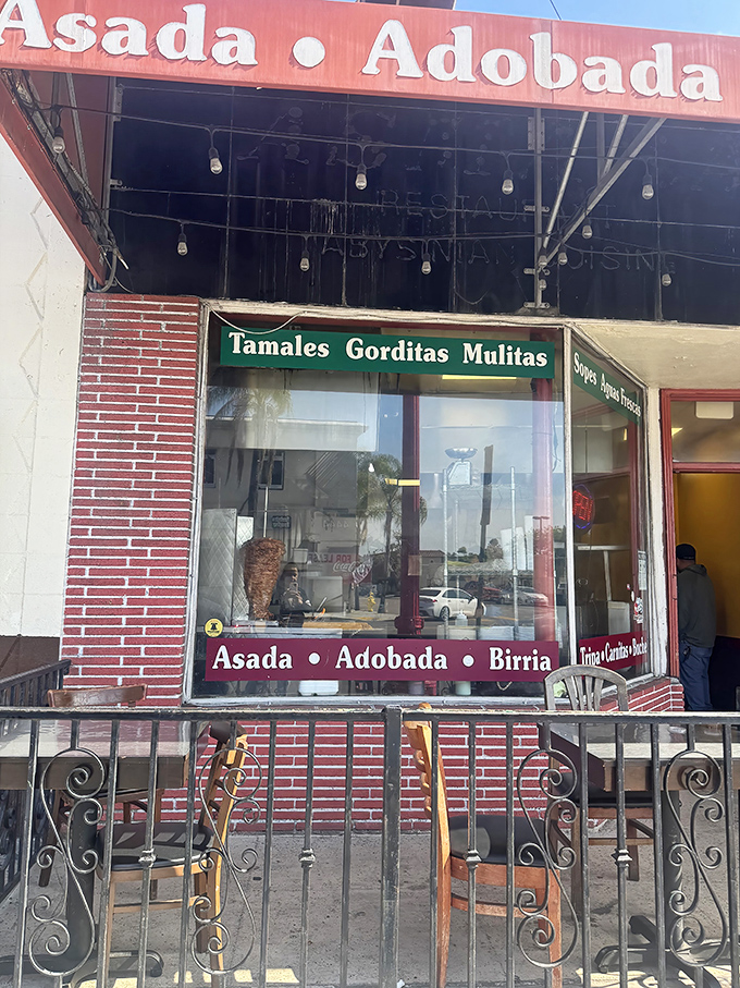 A glimpse of the exterior reveals the restaurant's specialties proudly displayed, like medals of honor earned in the culinary battlefield.
