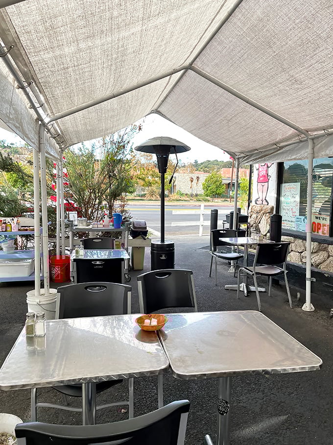 The outdoor patio offers a moment of calm before diving into the delicious chaos that awaits inside.