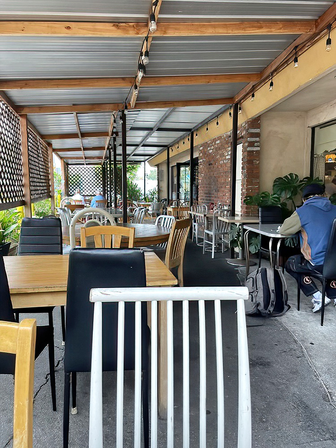Even the outdoor seating whispers promises of leisurely breakfast conversations and unhurried Saturday mornings.