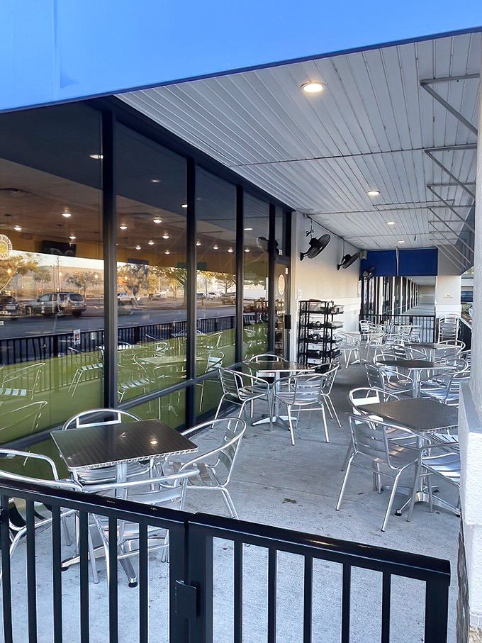 Outdoor seating for when your food coma requires fresh air. These metal chairs have witnessed countless "I shouldn't have eaten the whole thing" moments.