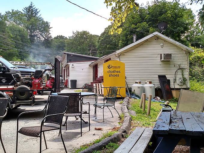 The casual outdoor seating area says, "Stay awhile," because good barbecue isn't just food – it's a social event worth lingering over.