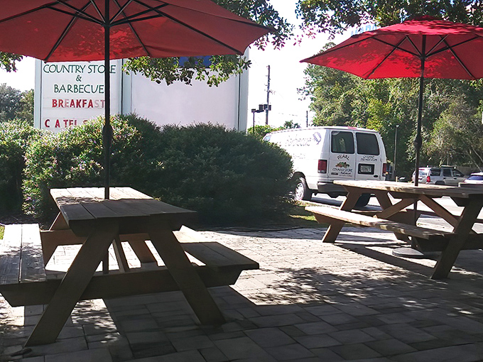 Outdoor seating under Florida skies. Those picnic tables have witnessed more food euphoria than most therapists' couches.