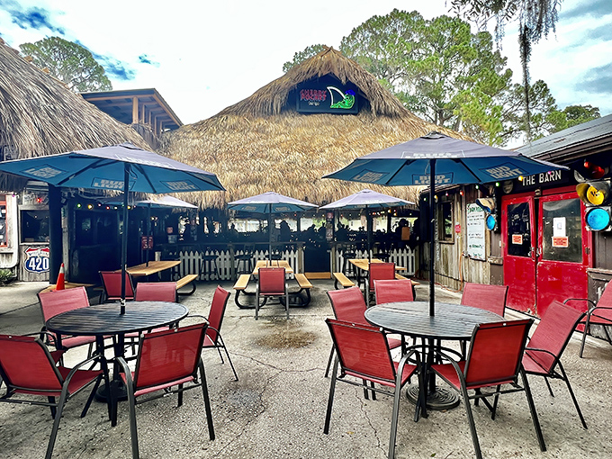 Tiki torches and palm fronds transform the outdoor space into a tropical escape right in Lake Wales.