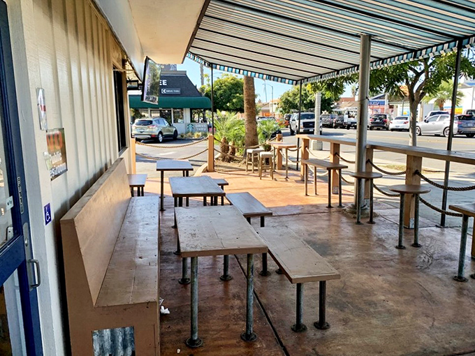 Outdoor seating where ocean breezes mingle with the scent of grilled meats. The perfect spot for people-watching with a burrito in hand.