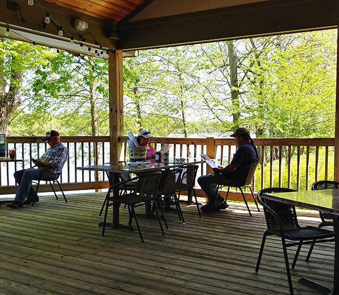 Riverside dining that adds nature's soundtrack to your meal. The view's so peaceful you might forget you came for the catfish.
