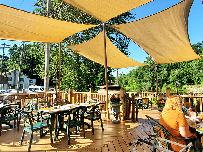Outdoor dining under canvas sails&mdash;where summer breezes, good food, and nature create the kind of dining experience no interior designer could replicate.