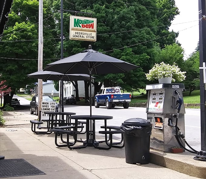 Outdoor seating where the entertainment is watching small-town life unfold. That Mountain Dew sign has probably witnessed more first dates than most matchmakers.