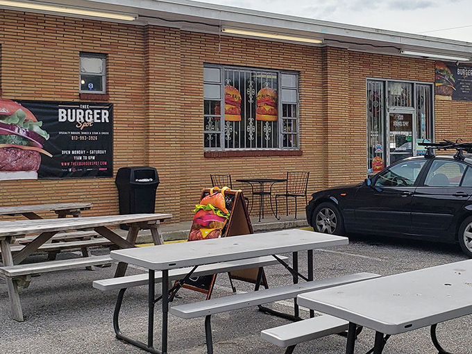 The outdoor picnic tables offer al fresco dining for those who prefer their burger bliss with a side of Florida sunshine.