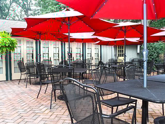 Summer dining under crimson umbrellas &ndash; an outdoor patio where Amish buggies might clip-clop past while you sip something spectacular.