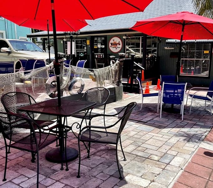The outdoor patio offers fresh air with your fresh seafood &ndash; a perfect Florida dining equation under cheerful red umbrellas.