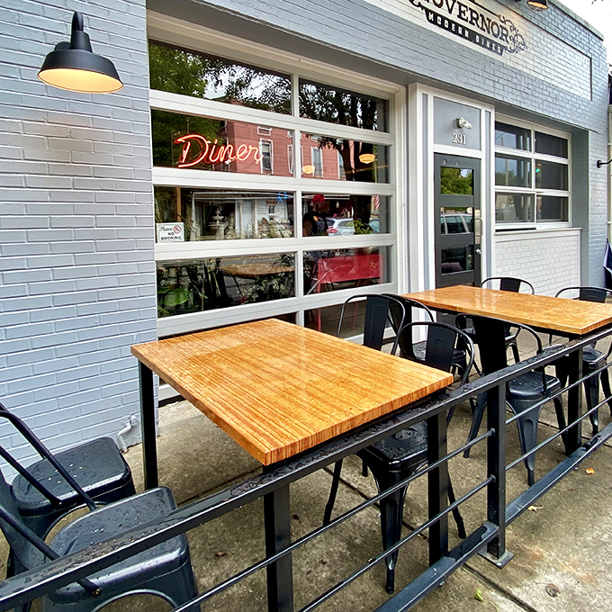 Outdoor tables bathed in sunshine offer front-row seats to Milford life, turning sidewalk dining into neighborhood theater.