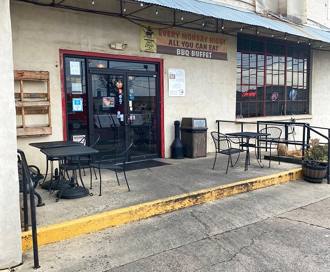 The modest patio offers al fresco dining for those who prefer their smoke-kissed meats with a side of fresh air and people-watching.