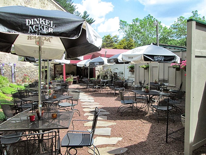 The outdoor patio &ndash; where summer evenings stretch like lazy cats and umbrellas stand guard against anything that might rush your meal.